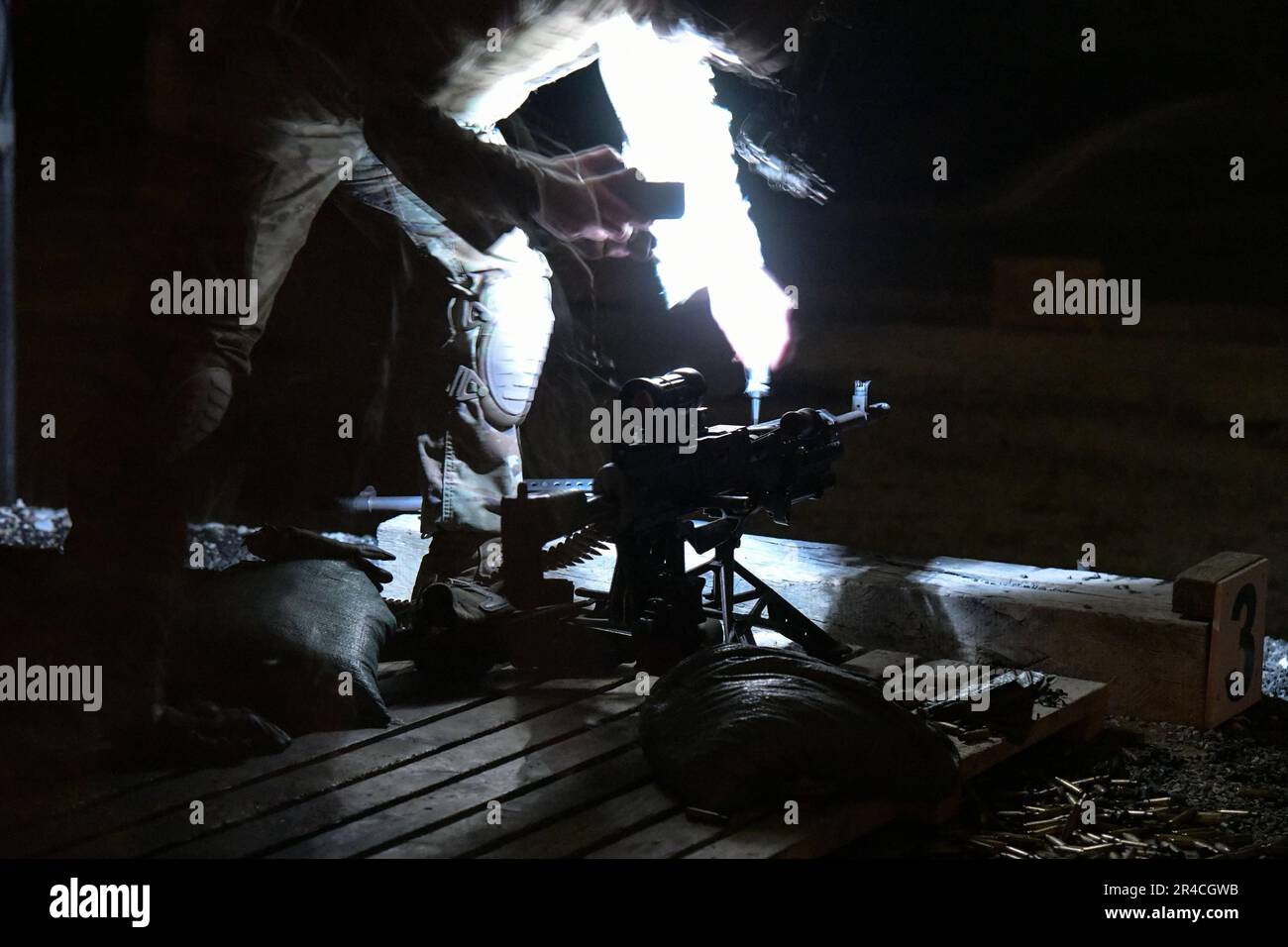 A U.S. Soldier assigned to 4th Squadron, 2nd Cavalry Regiment zeros an ...