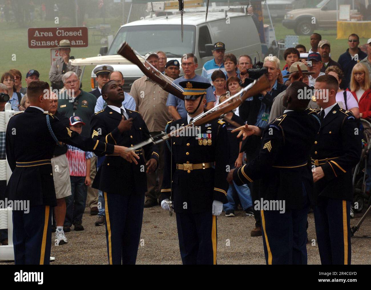 US Navy The U.S. Army drill team executes a precision rifle ...