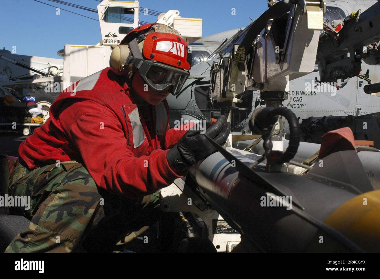 US Navy Aviation Ordnanceman 2nd Class assigned to the Top Hatters of ...