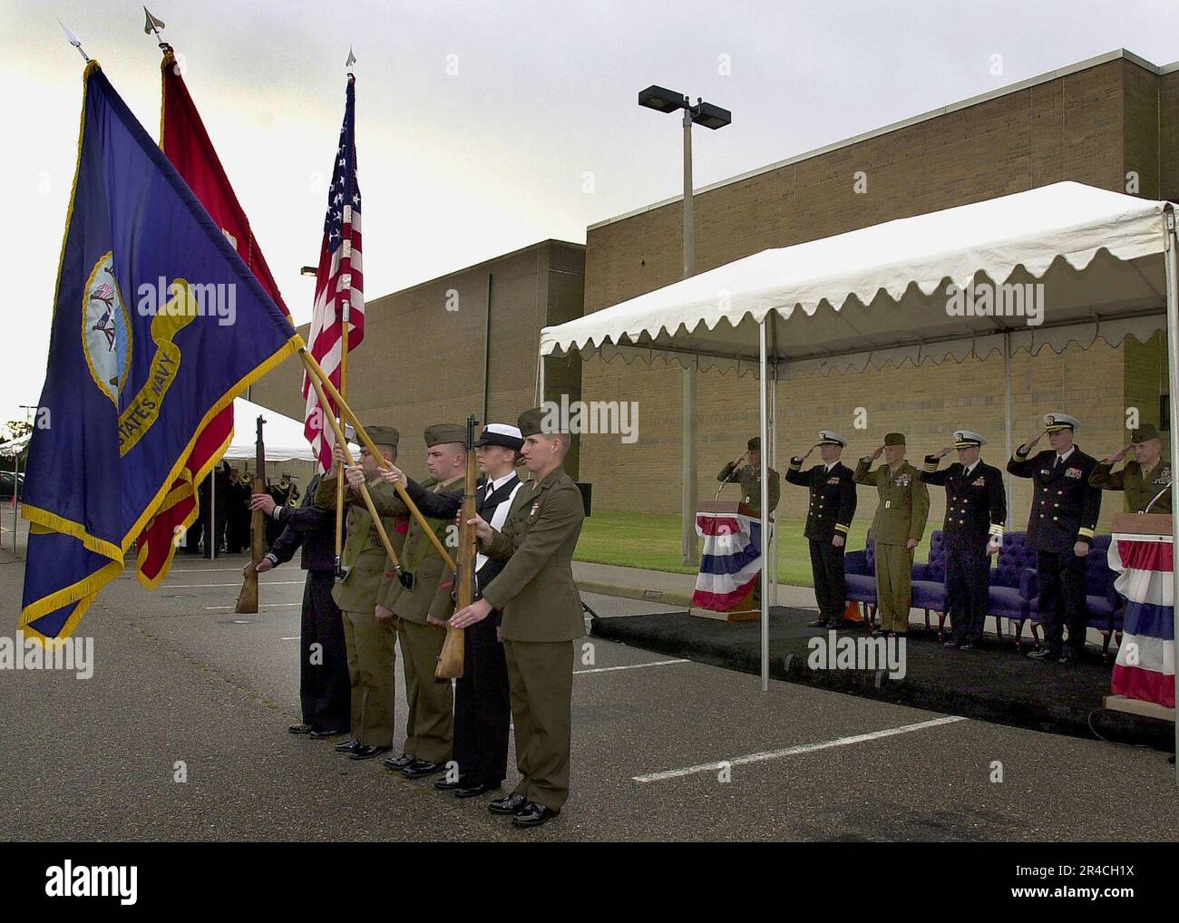 US Navy The official party salutes as the colors are paraded at the ...