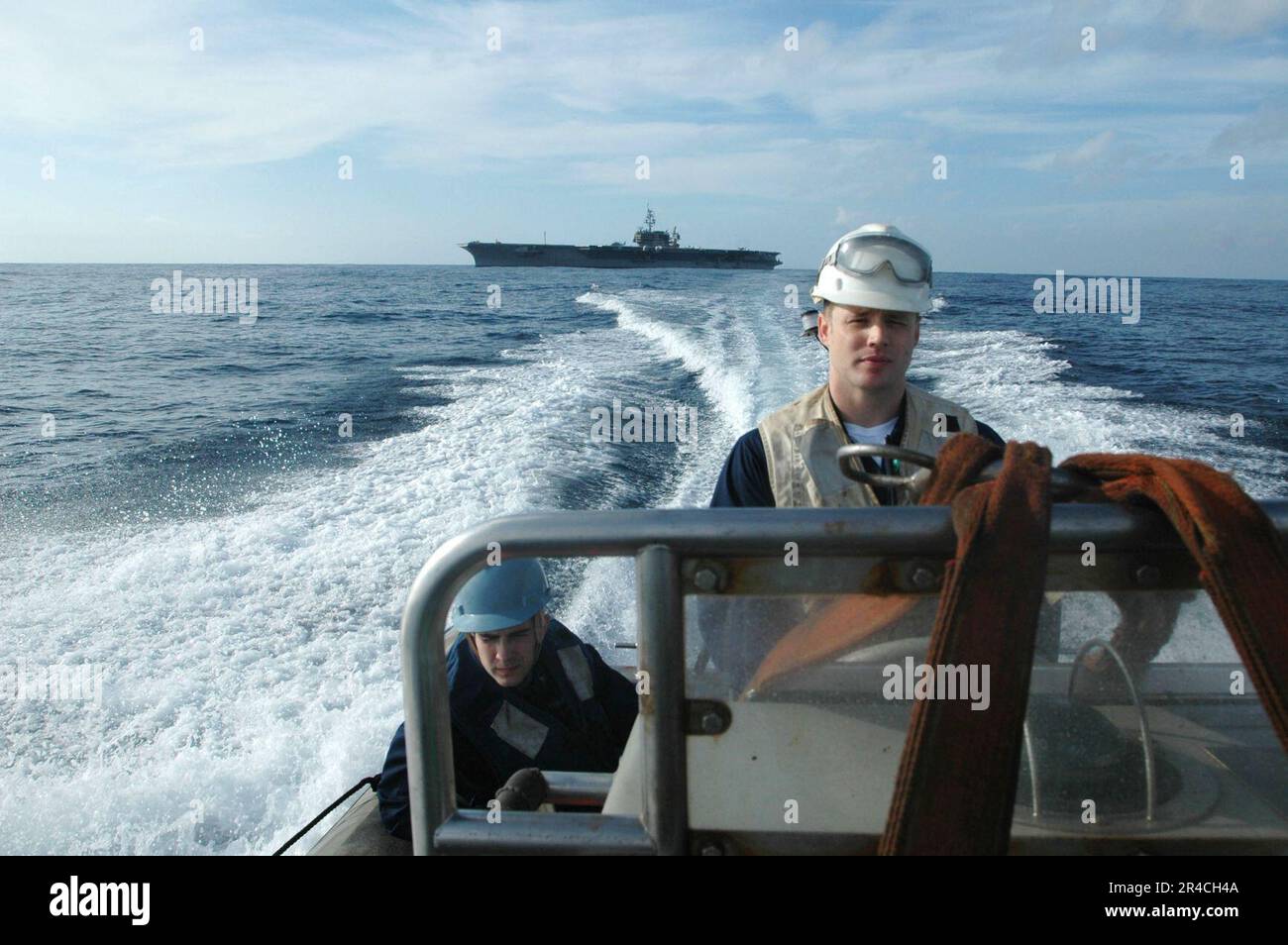 US Navy Boatswain's Mate 2nd Class right, and Engineman 2nd Class drive ...