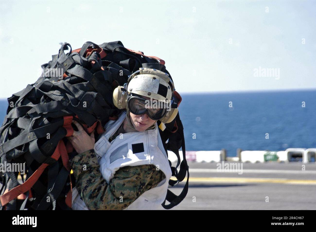 US Navy An embarked combat cargo Marine aboard USS Bataan (LHD 5 ...