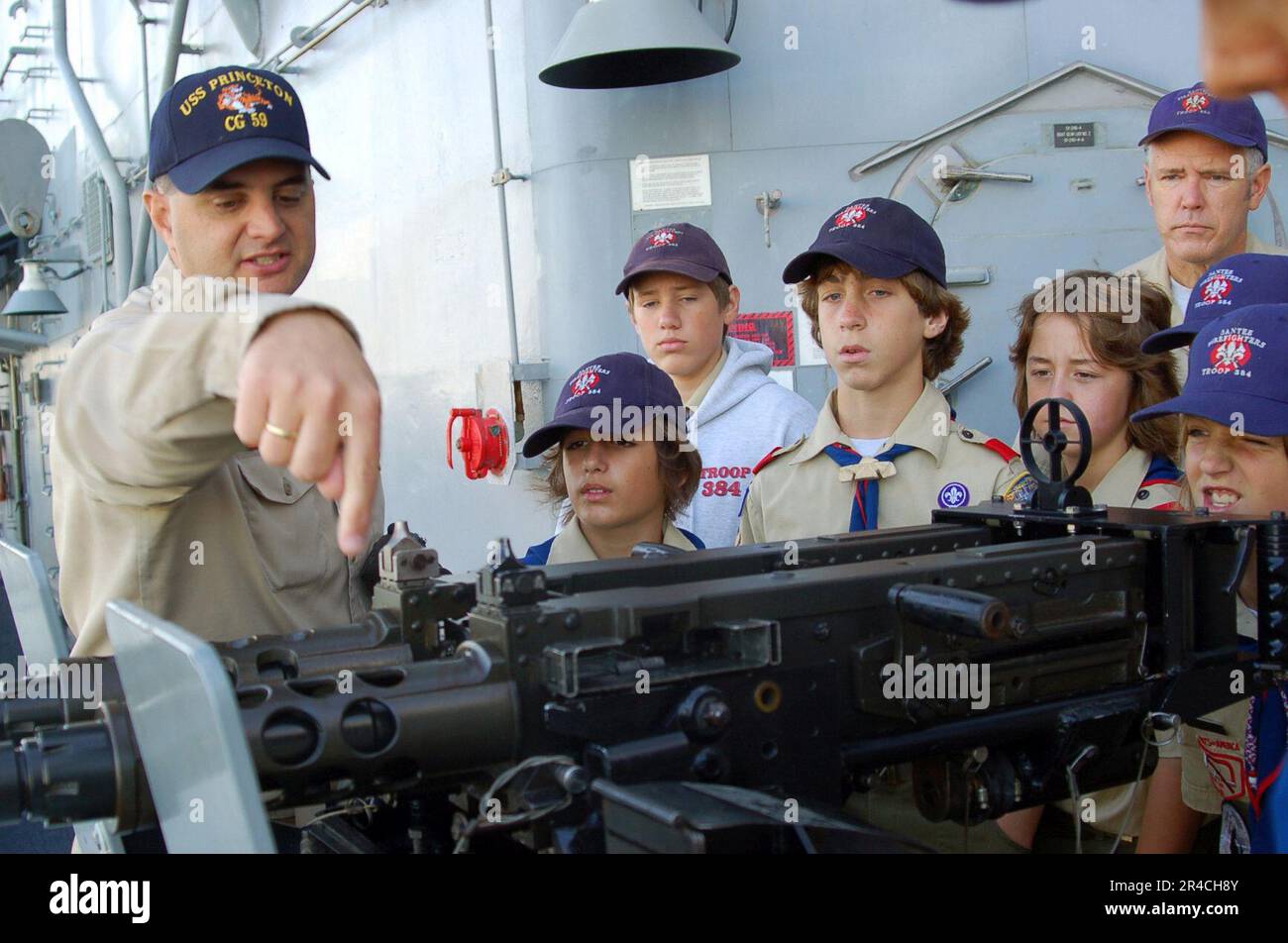 US Navy Senior Chief Cryptologic Technician (Collection) explains to ...