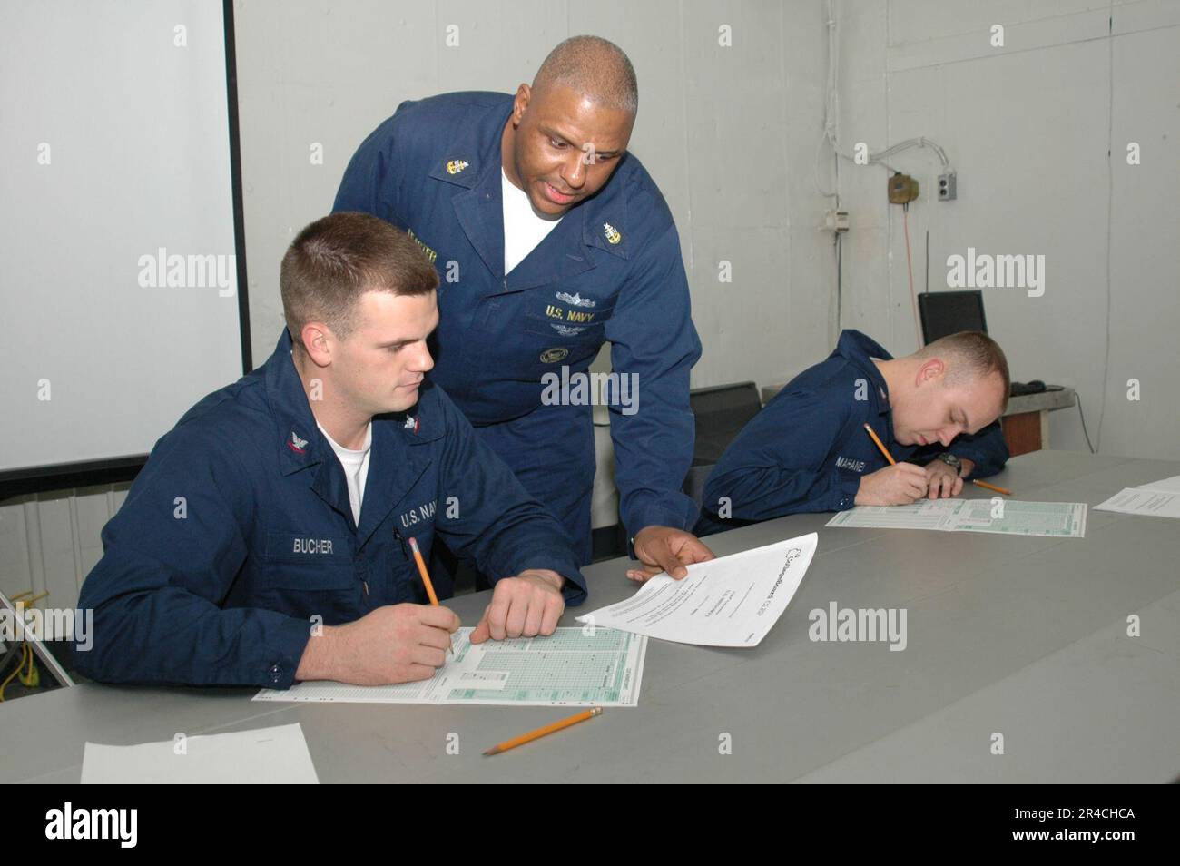 US Navy Senior Chief Navy Career counselor answers questions a Sailor ...