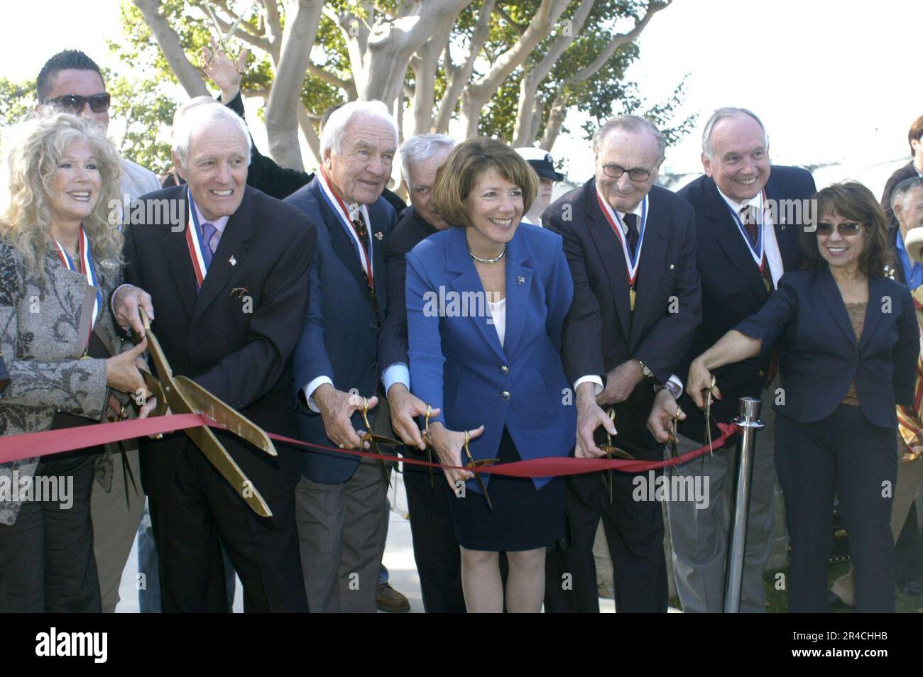 US Navy Actress Connie Stevens and Congresswoman Susan Davis lead the ribbon cutting ceremony ...