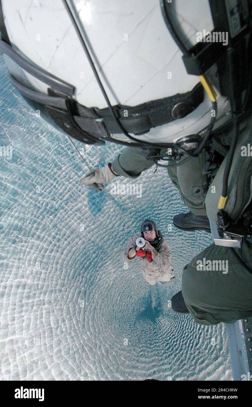 US Navy A Sailor assigned to Explosive Ordnance Disposal Mobile Unit ...