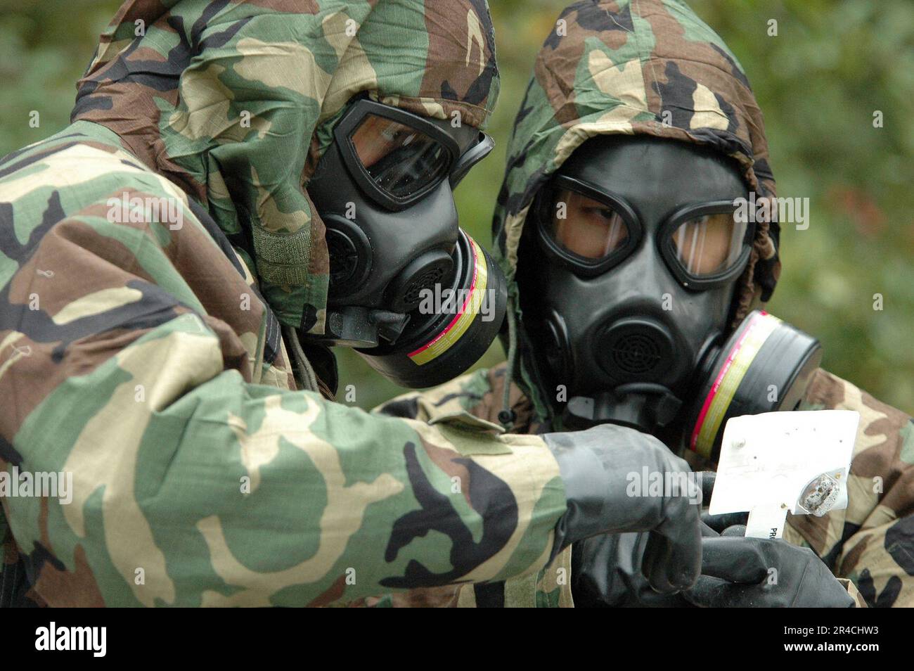 US Navy Explosive Ordnance Technician 2nd Class and Lt. j.g. from ...