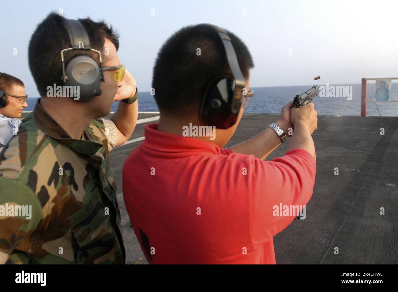 US Navy Master-at-Arms 1st Class 9mm Beretta pistol instructor Stock ...