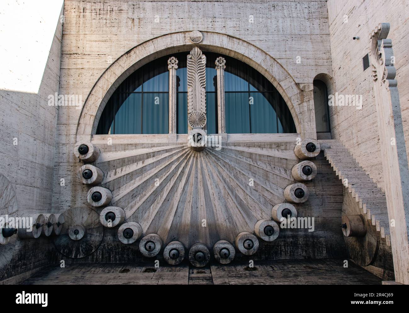 Modern fountain with the peacock feather form stones concept photo ...