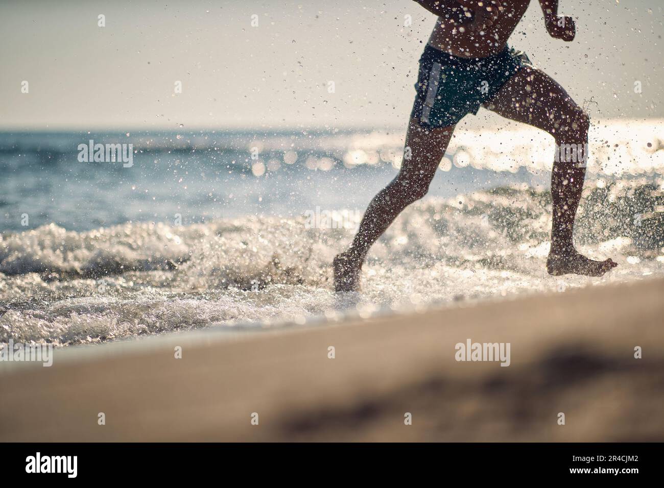 Muscular men in water hi-res stock photography and images - Alamy