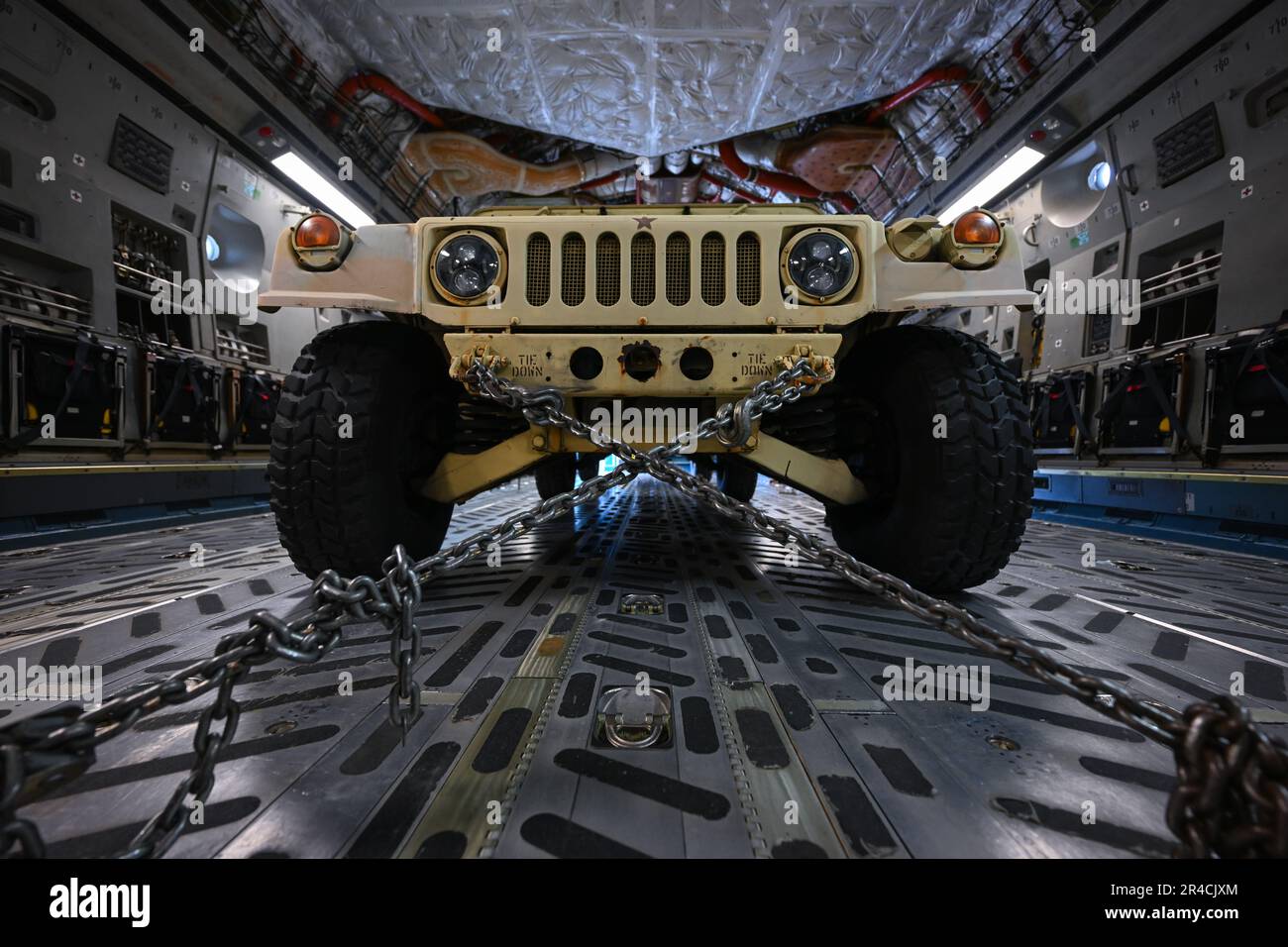 U.S. Air Force loadmasters assigned to the 317th Airlift Squadron ...