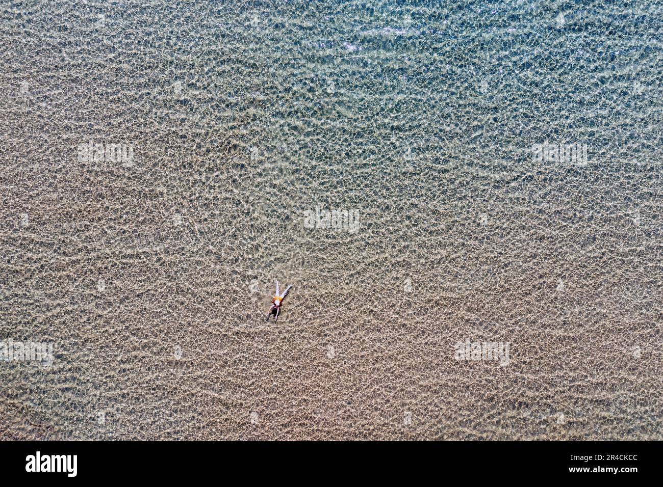 Woman swims in transparent hi-res stock photography and images - Alamy