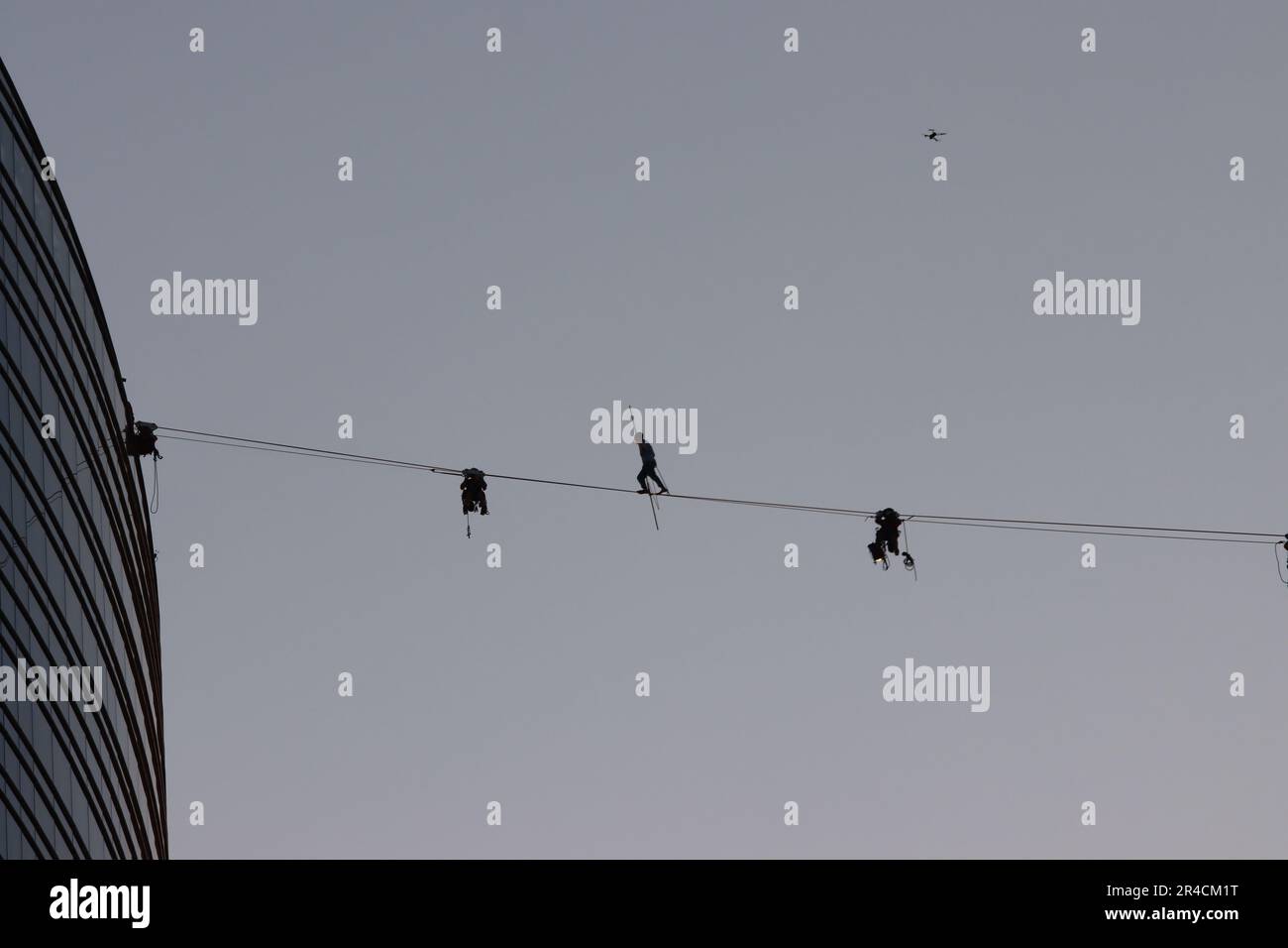 Adult walking tightrope hi-res stock photography and images - Alamy