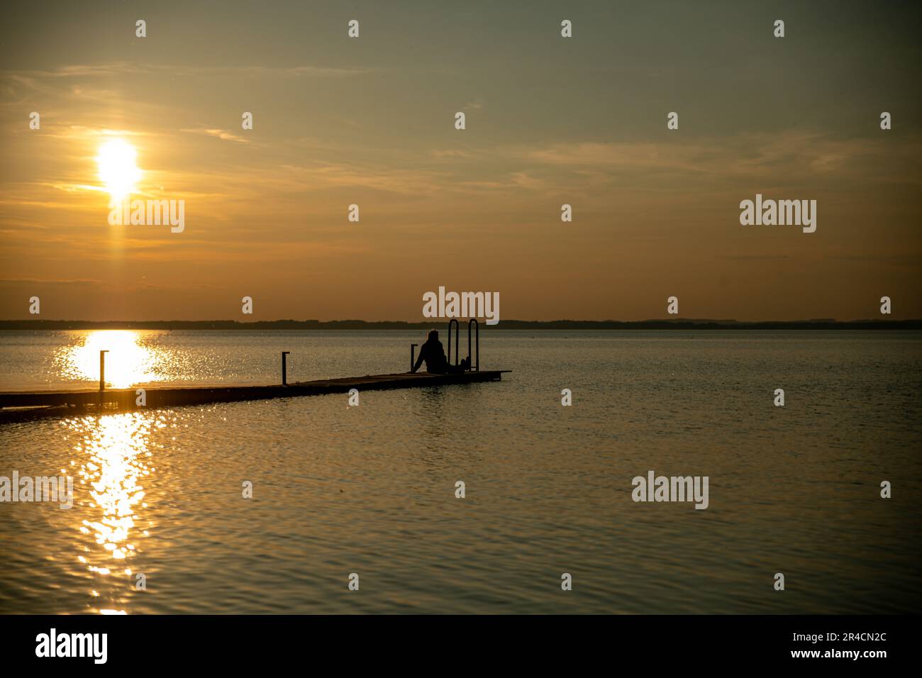 Woman jetty silhouette hi-res stock photography and images - Alamy