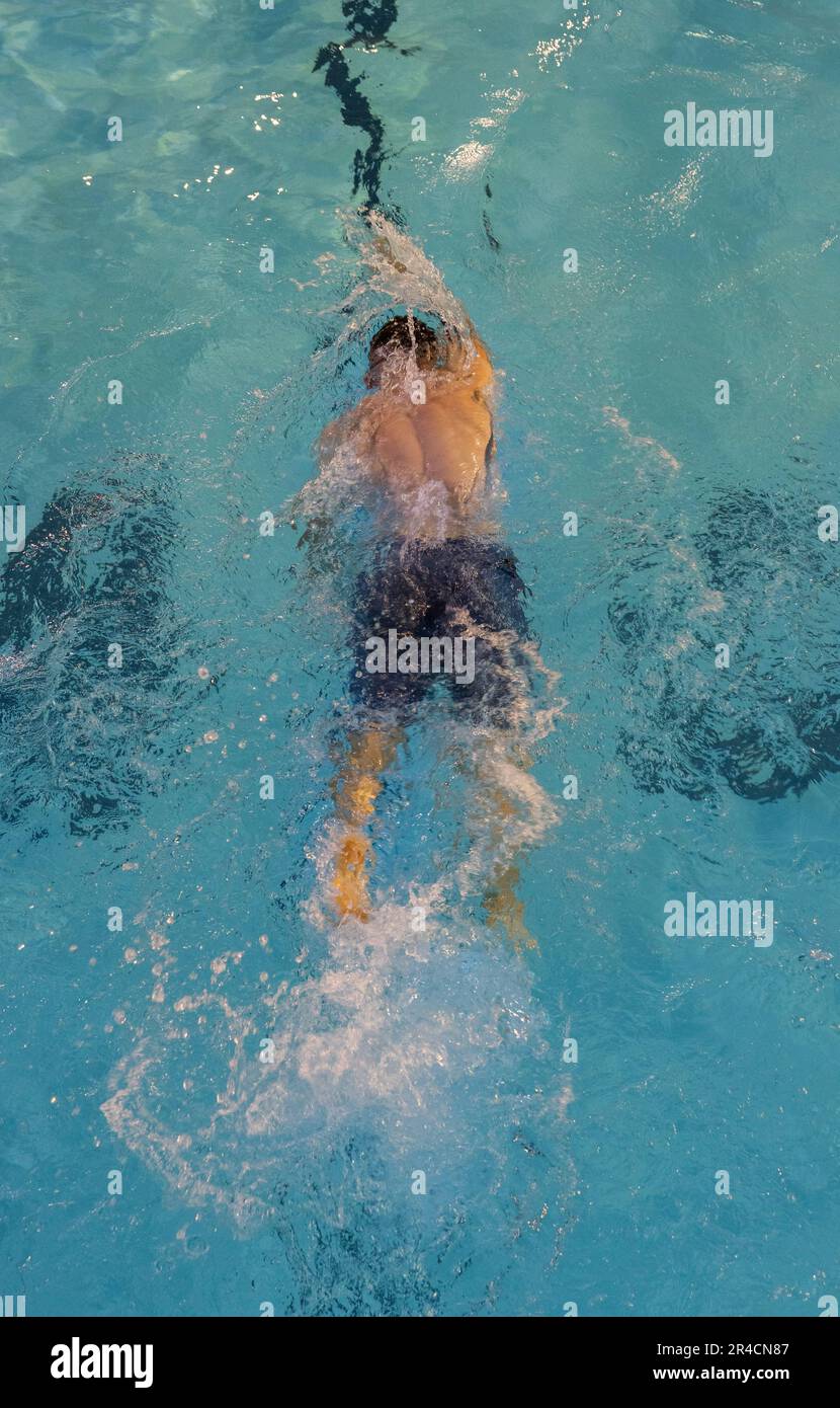 A U.S. Marine swims during the “Tarawa Atoll” swimming event during the ...