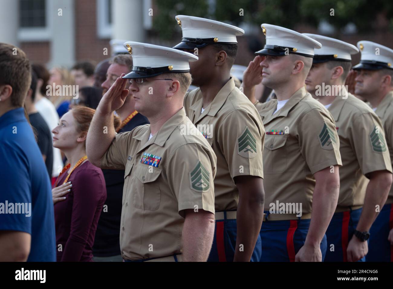 U.S. Marines with the Eastern Recruiting Region render a salute during ...