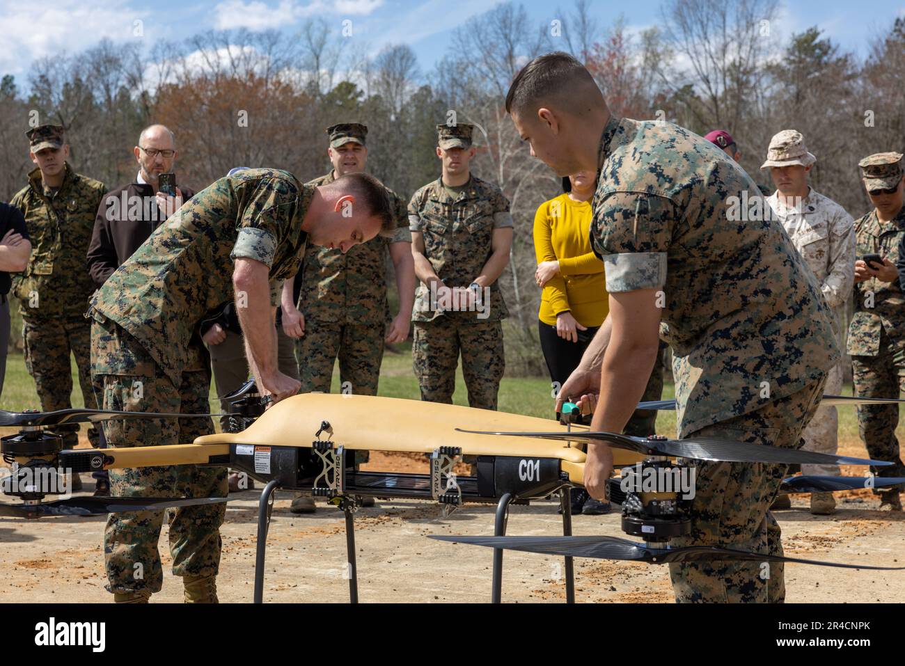 U.S. Marine Corps Cpl. Russell S. McGuire, right, and Cpl. Ian D. Lowe ...