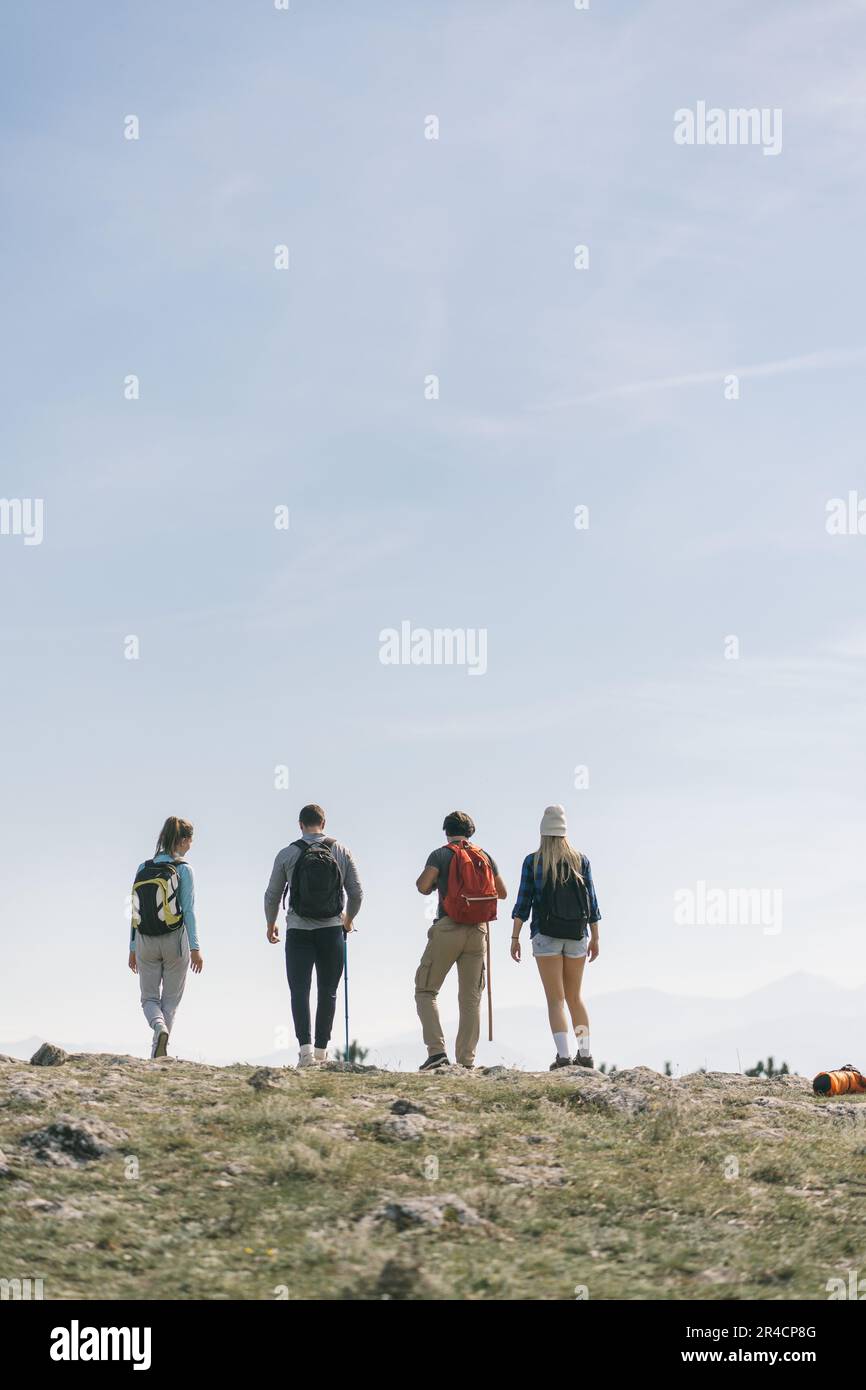 Best friends hiking at the top of the mountain Stock Photo - Alamy