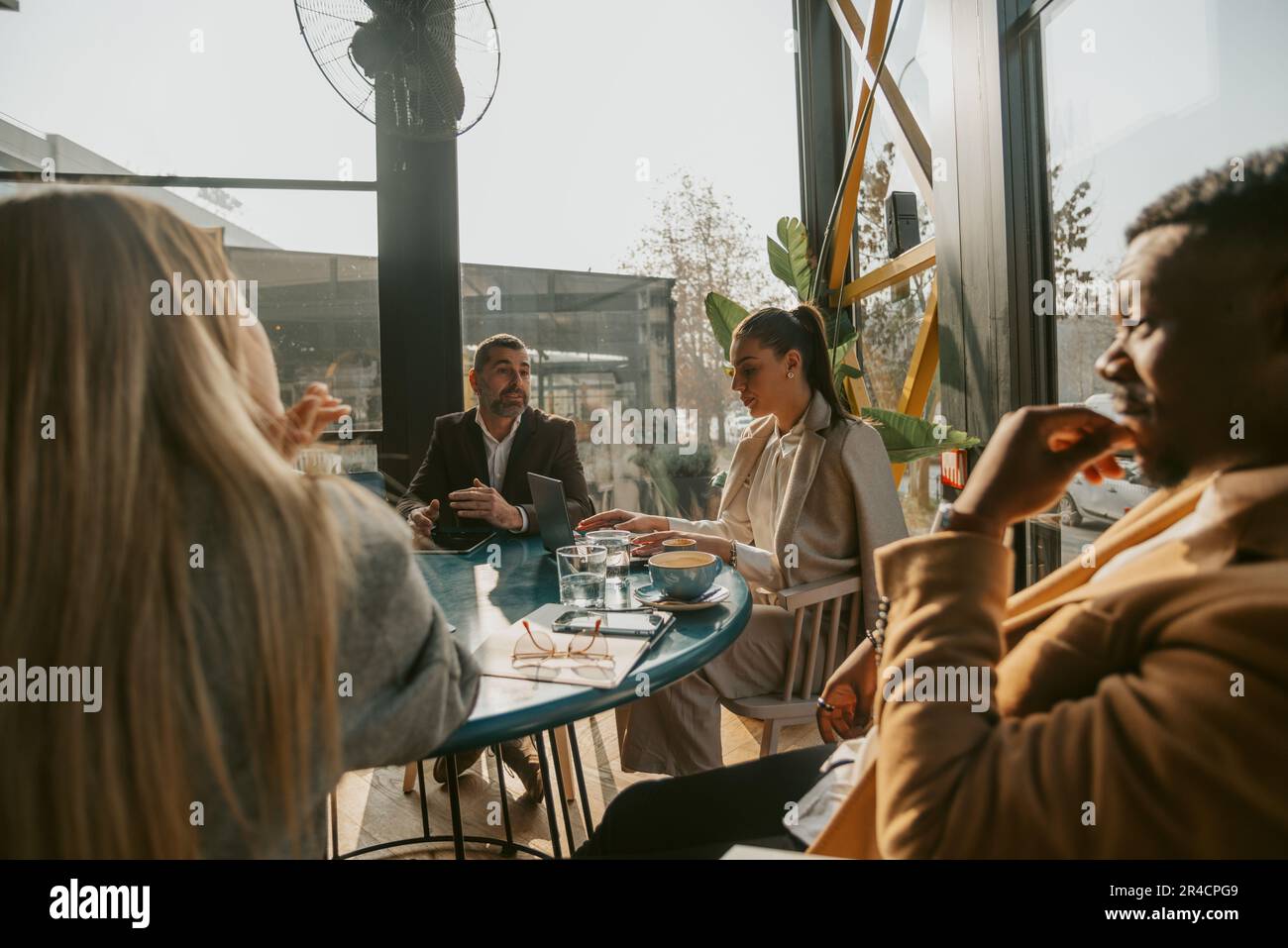 Cheerful businessmen having conversation smiling hi-res stock ...