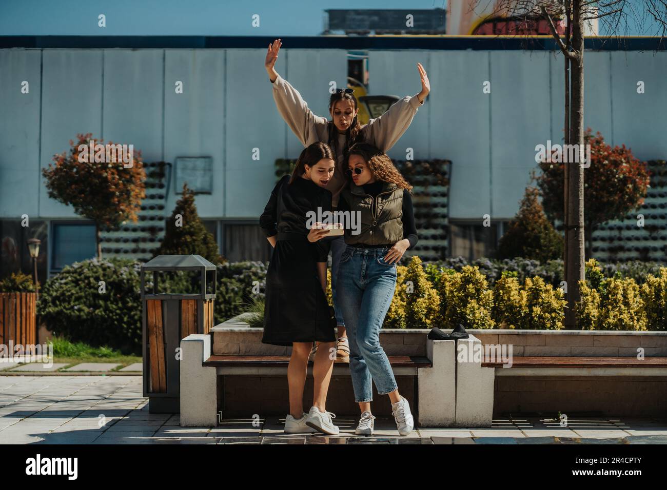 Beautiful girls hanging out on a beautiful sunny day. They are taking a ...