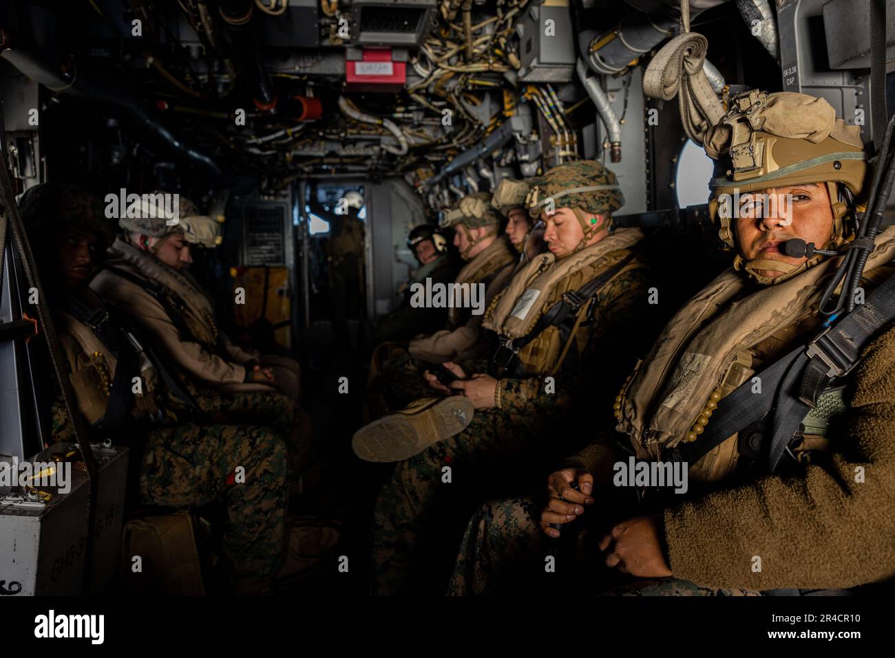 U.S. Marines with 3rd landing support battalion (LSB) fly in an MV-22b ...