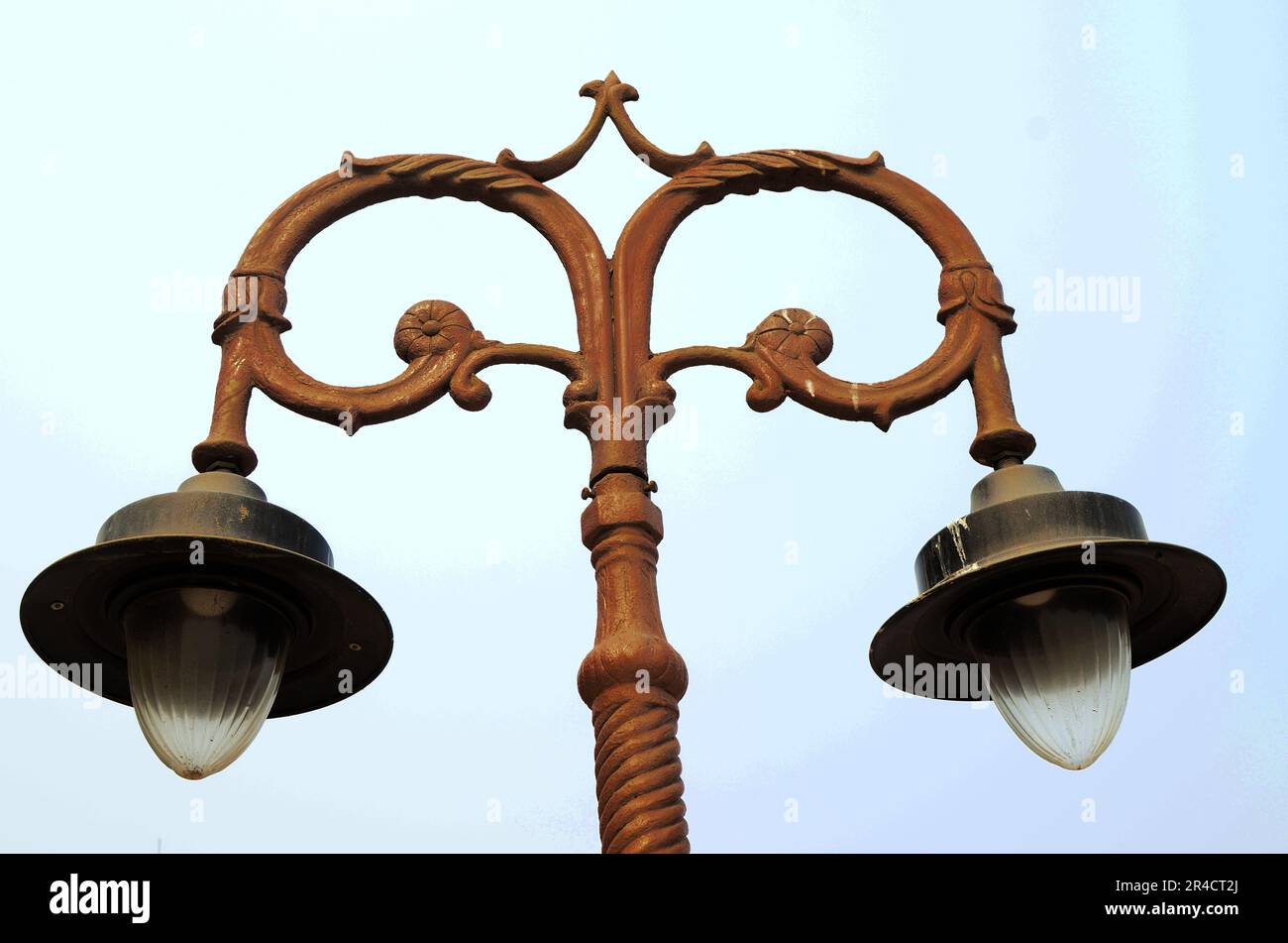 Old vintage street lamp on the road at night. Old vintage streetlight ...