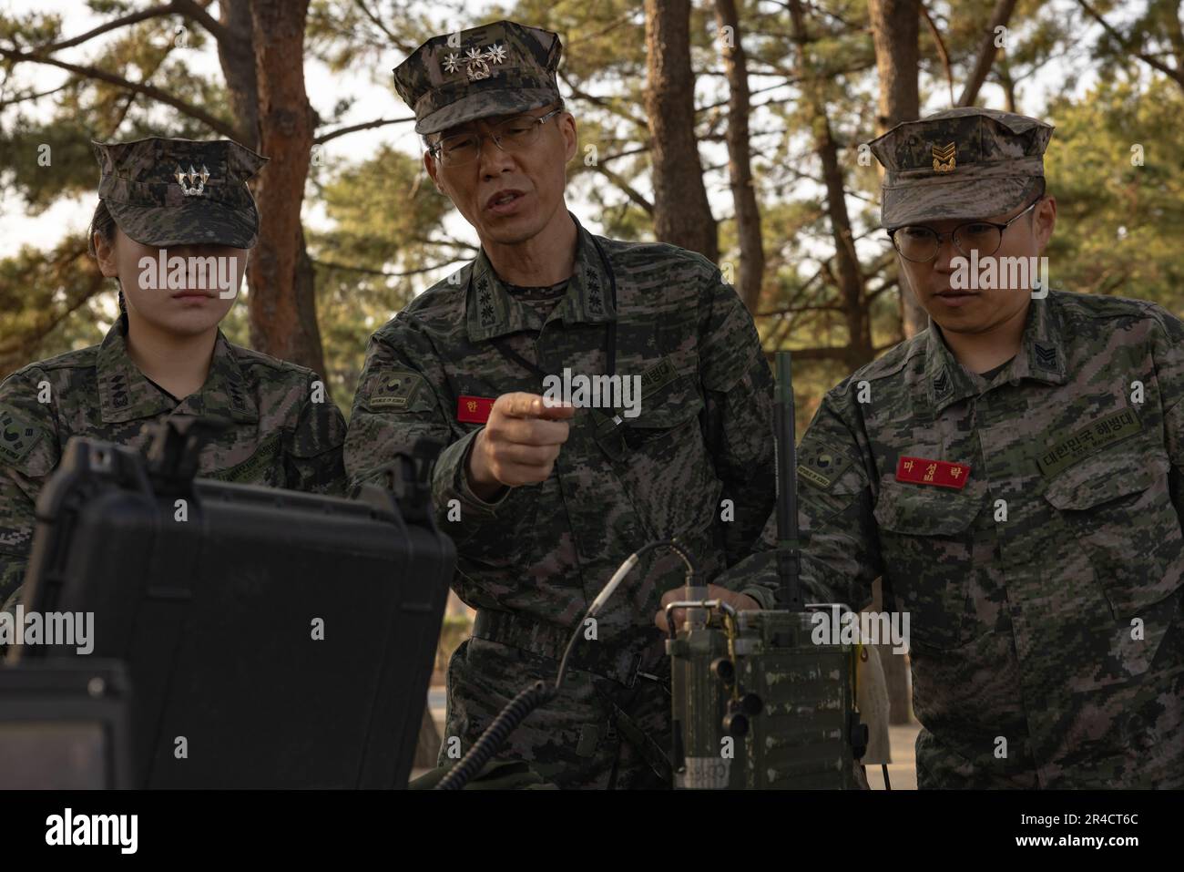 Republic of Korea Marine Corps Col. Han Meong Su, center, Capt. Kim Na ...