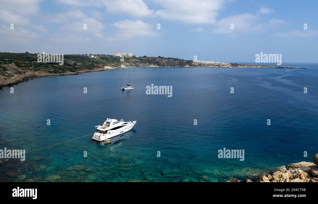 Tourist yachts with people sailing in the sea. Summer holidays in the ...