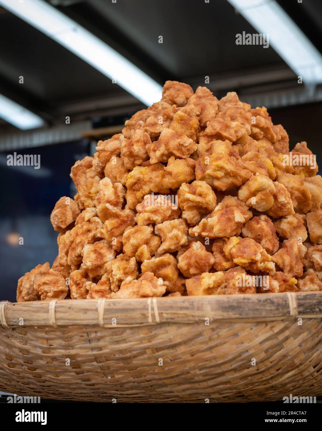A mountain of karaage fried chicken in a basket in Japan Stock Photo ...