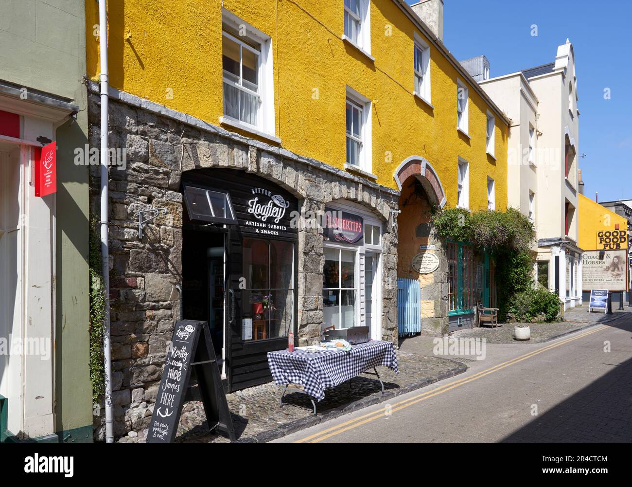 Colourful street in Tenby, Pembrokeshire, West Wales Stock Photo - Alamy