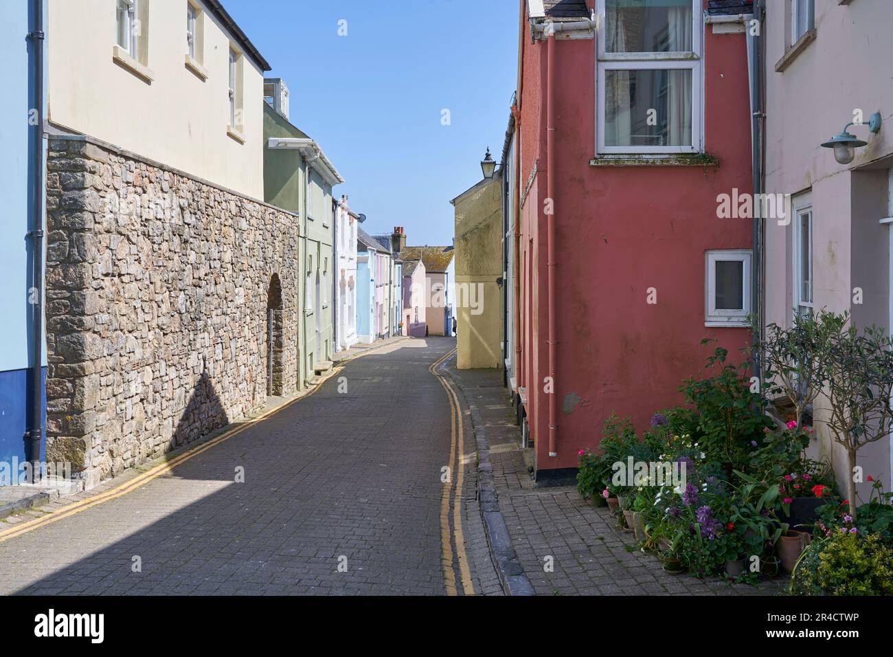 Colourful homes in a street in Tenby, Pembrokeshire, West Wales Stock ...