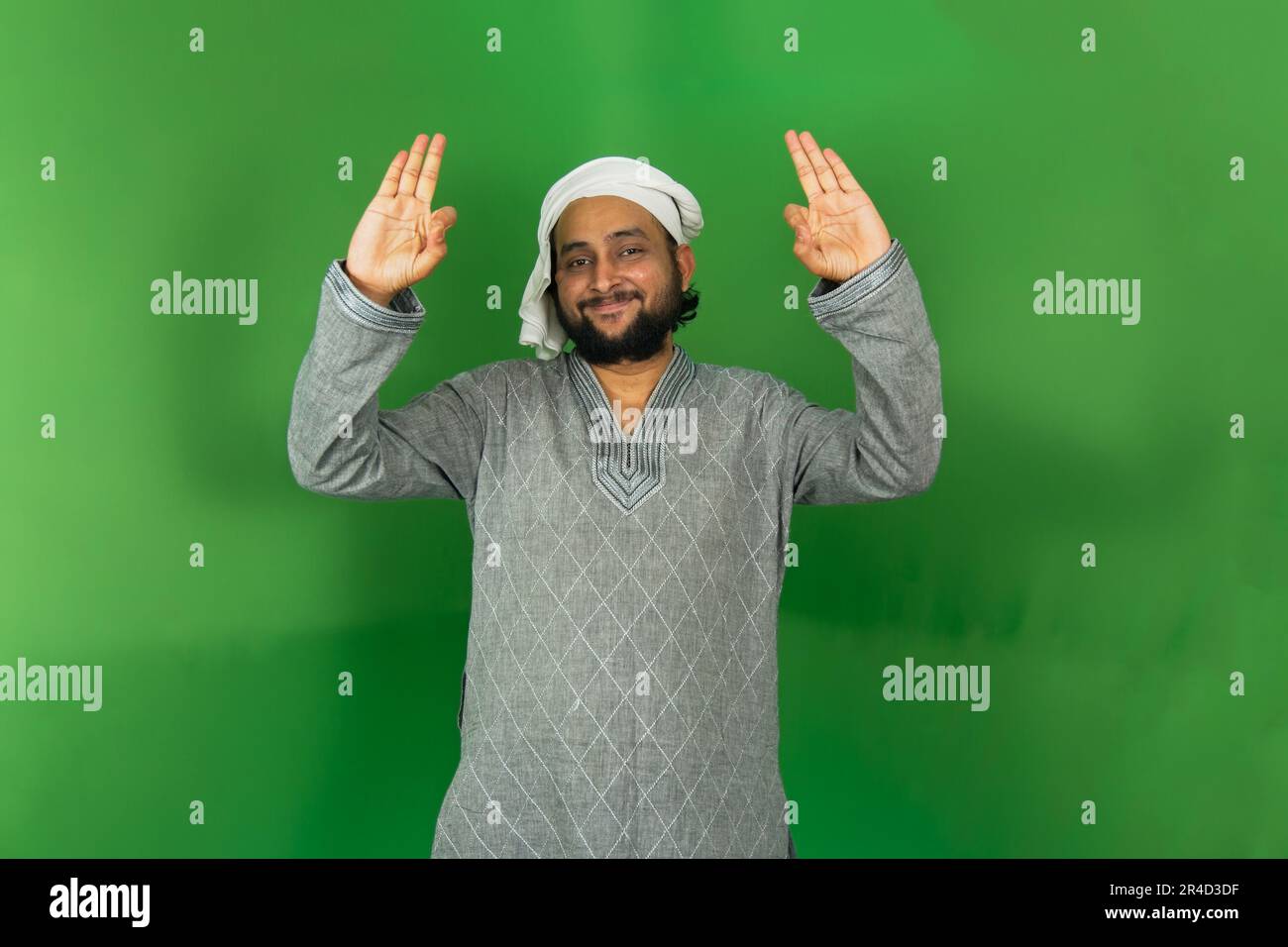 Young Indian farmer okay symbol both hand with smiling and looking at ...