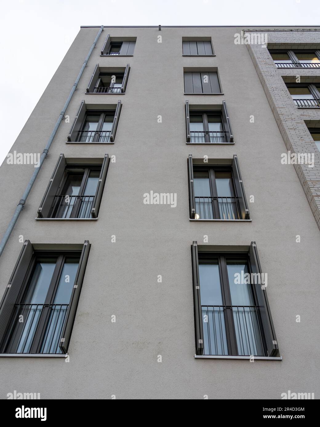 An elevated view of a contemporary high-rise building taken from ground ...