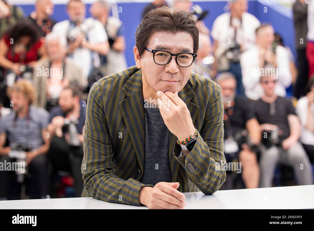 Director Kim Jee-woon poses for photographers at the photo call for the ...