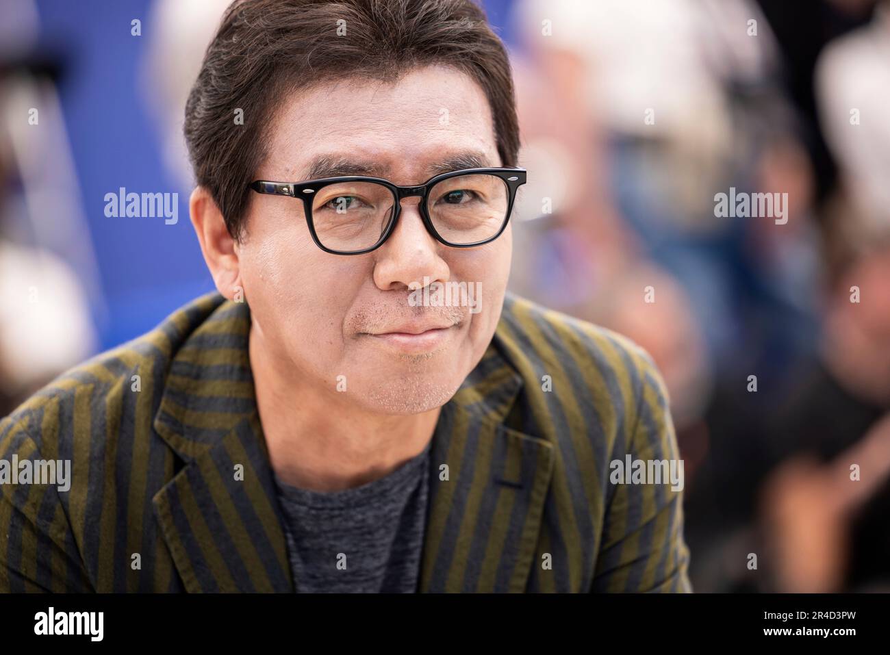 Director Kim Jee-woon poses for photographers at the photo call for the ...