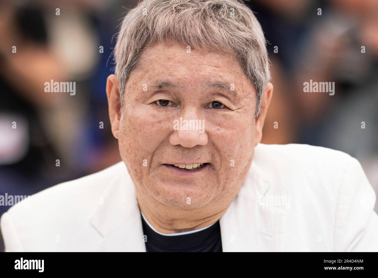 Director Takeshi Kitano poses for photographers at the photo call for the film 'Kubi' at the ...