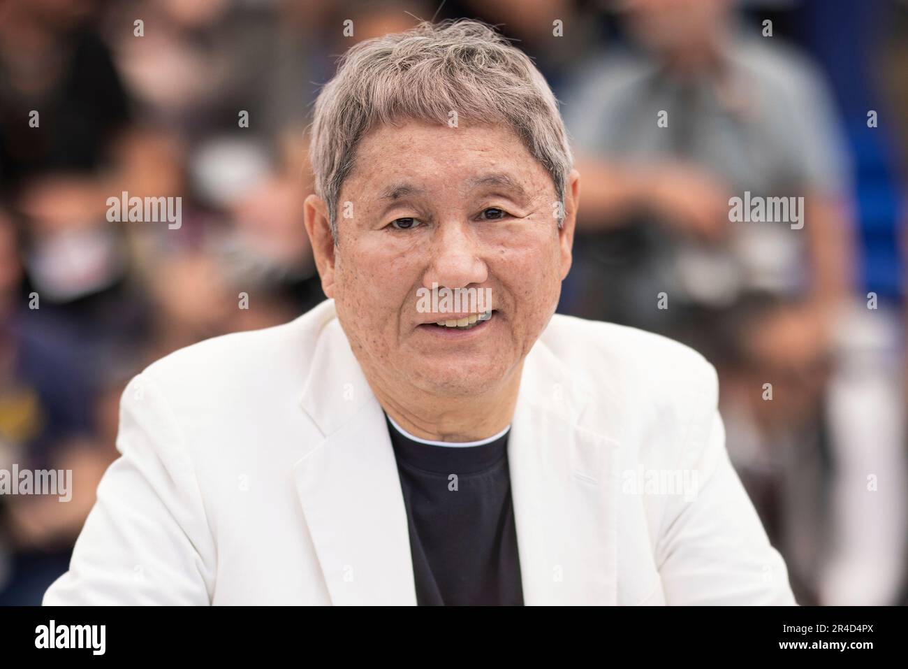Director Takeshi Kitano poses for photographers at the photo call for ...