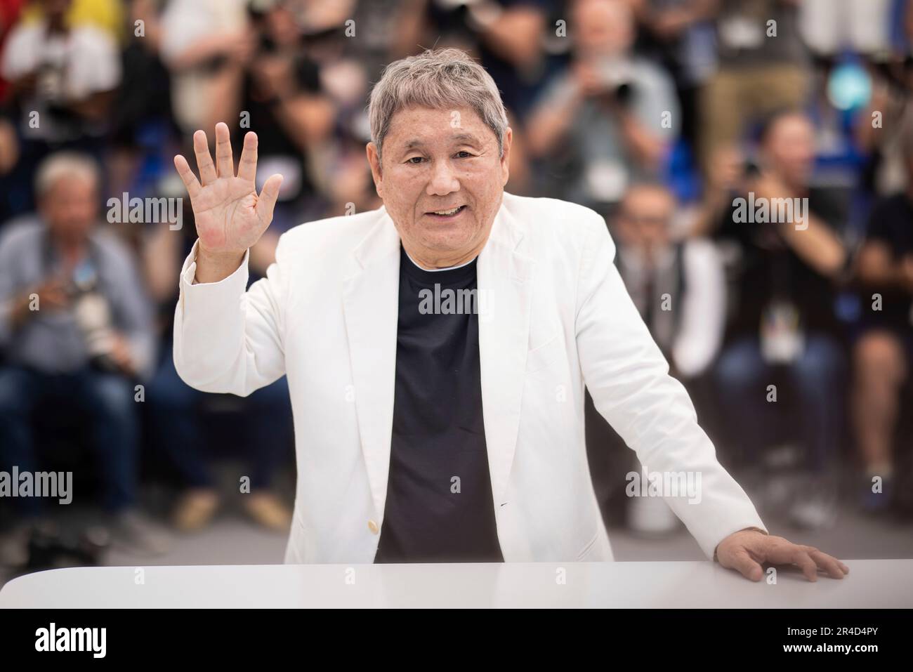 Director Takeshi Kitano poses for photographers at the photo call for ...