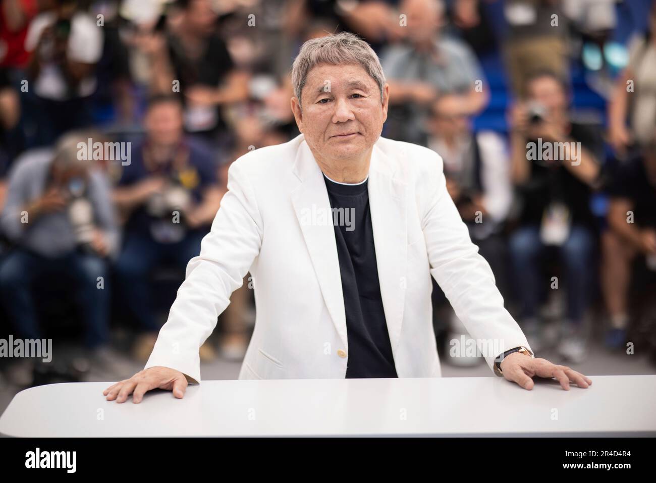 Director Takeshi Kitano poses for photographers at the photo call for ...
