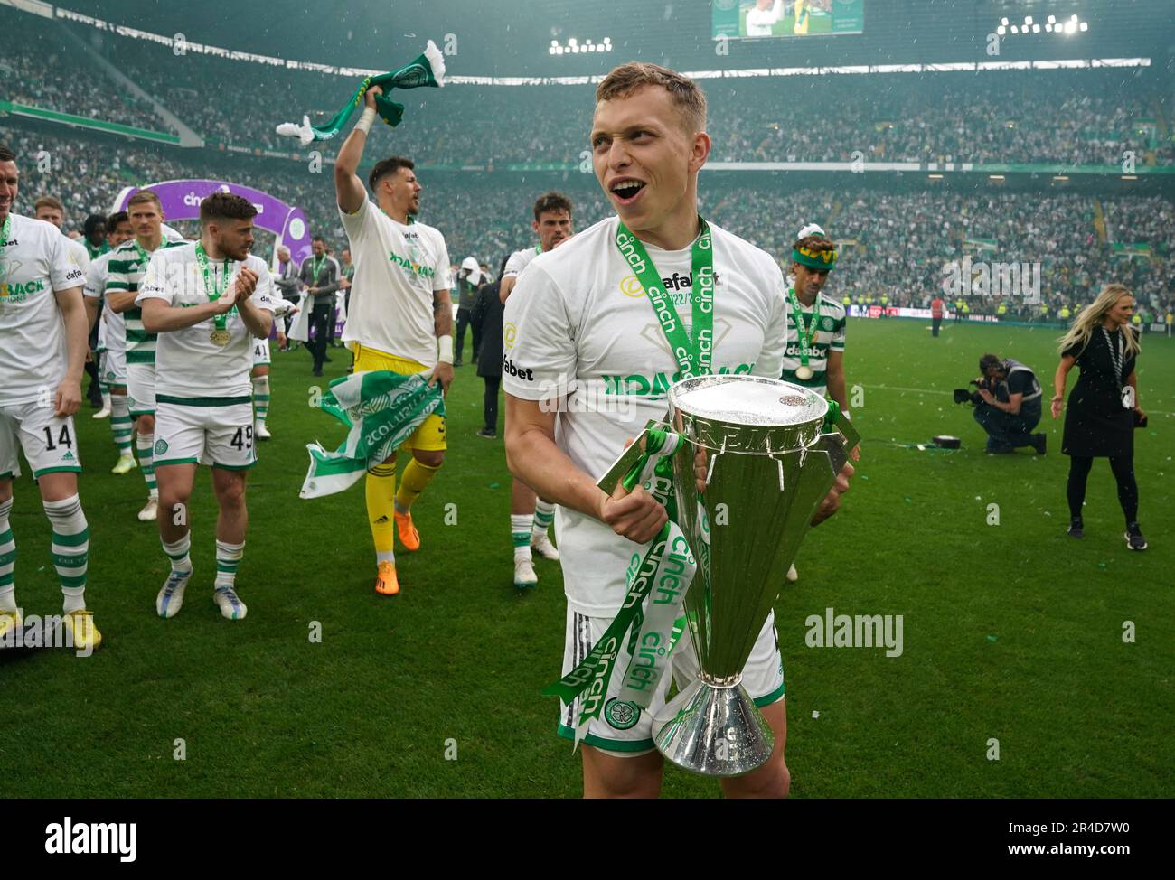 Celtic's Alistair Johnston celebrates with the league trophy after the ...