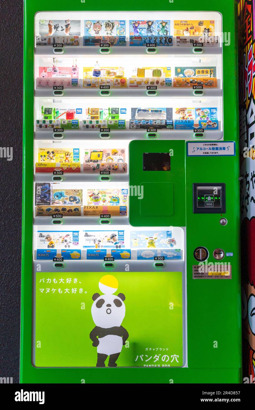 Japanese green coloured toy vending machine at Terminal one in Haneda ...