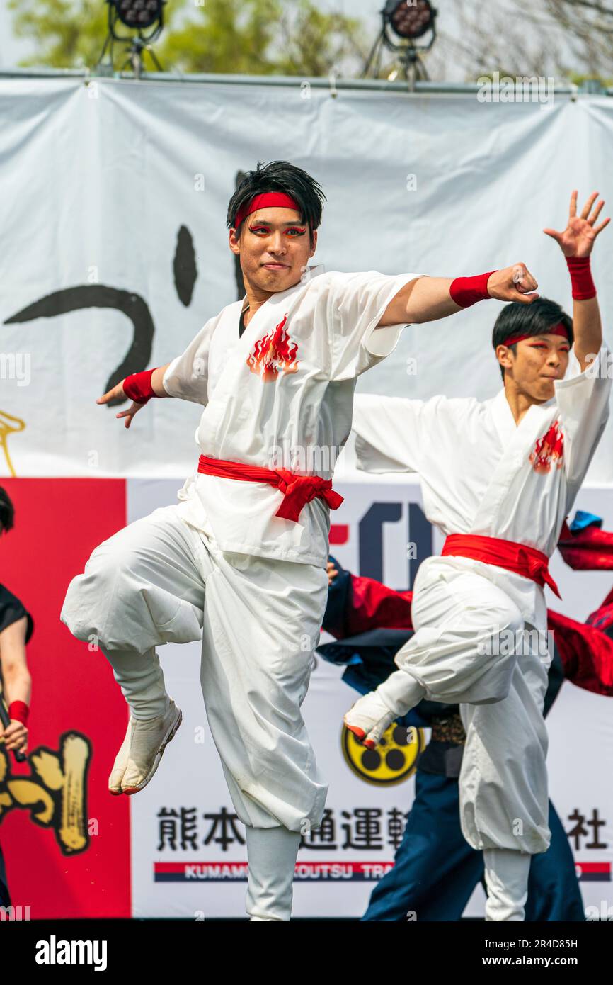Japanese young men Yosakoi dancers wearing white yukata and trousers ...