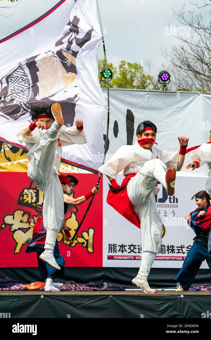 Japanese young men Yosakoi dancers wearing white yukata and trousers ...