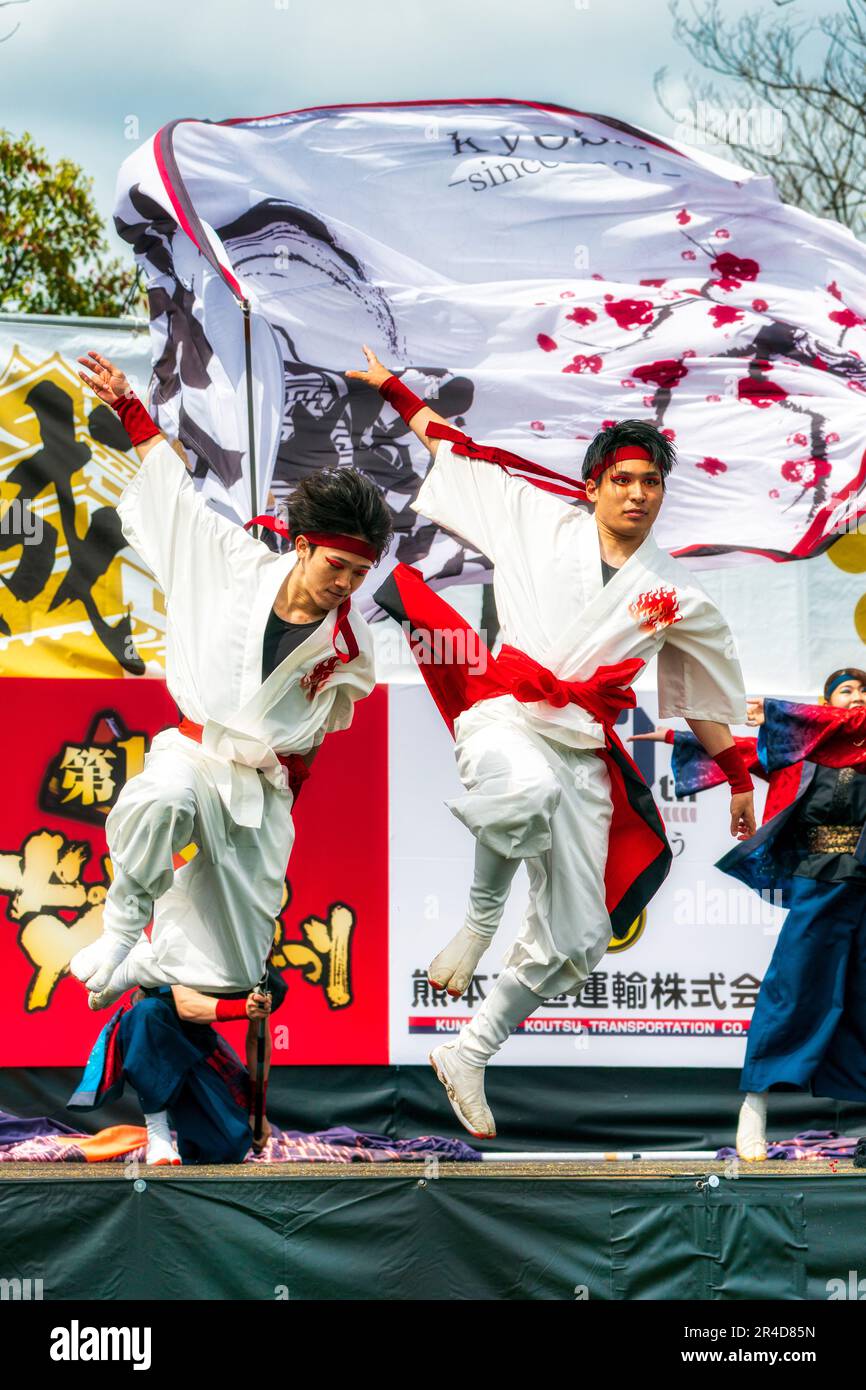 Japanese young men Yosakoi dancers wearing white yukata and trousers ...