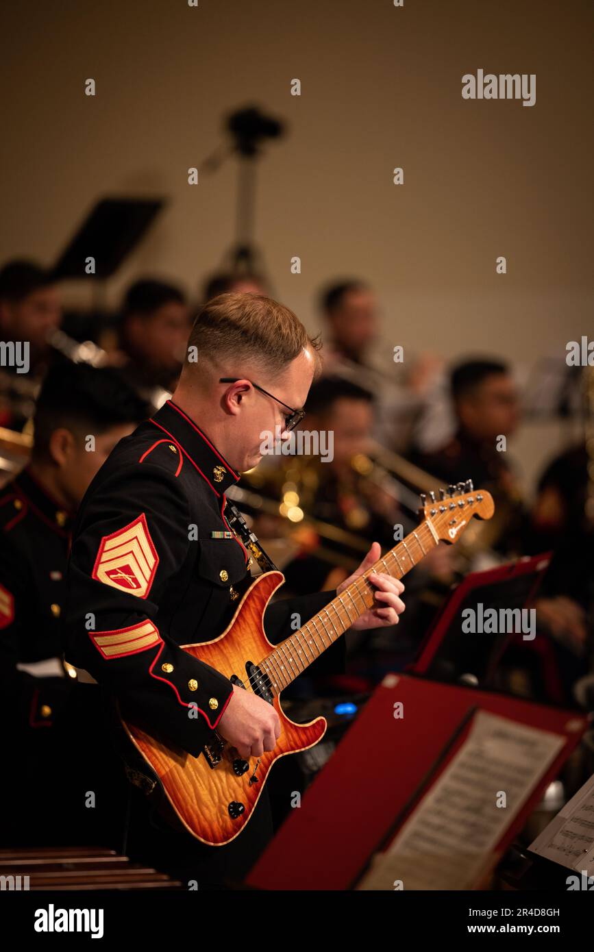 U.S. Marine Corps Staff Sgt. Michael Borowski, a guitarist with the III ...