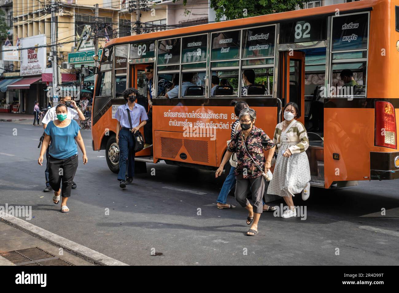 Passengers exit a public bus transportation on Chak Phet Road at The ...