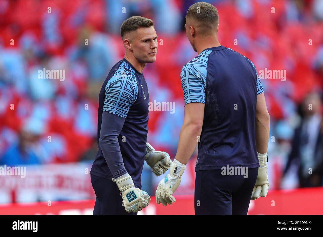 Ben Wilson #13 of Coventry City talking to Simon Moore #1 of Coventry ...