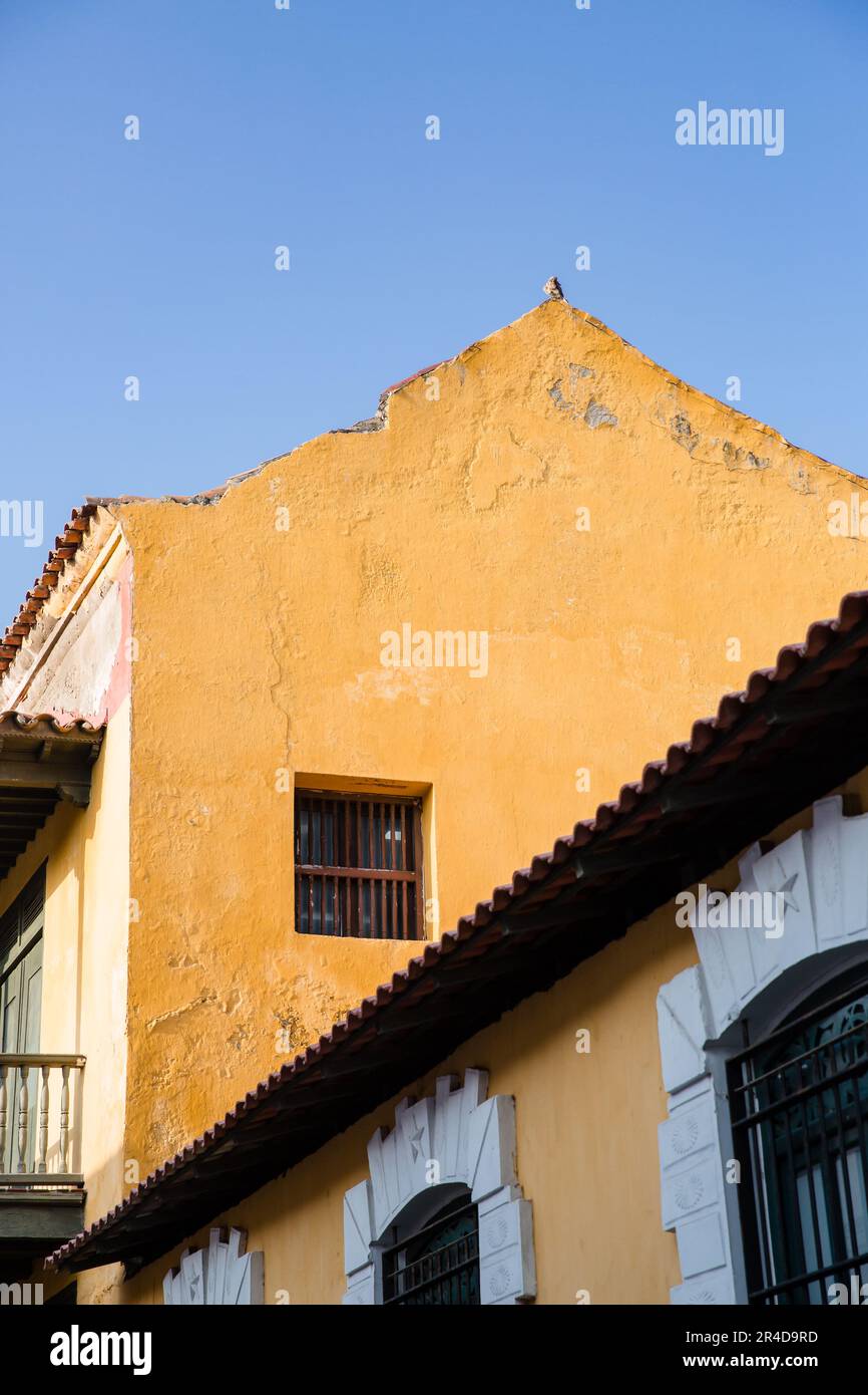 A golden yellow building on a sunny day in Cartagena Colombia Stock ...