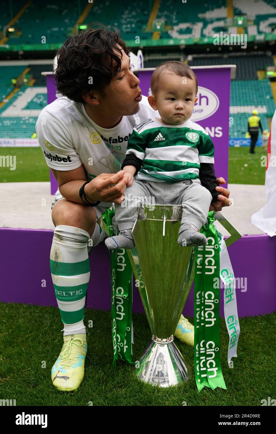 Celtic's Tomoki Iwata and family pose with the trophy after the cinch ...