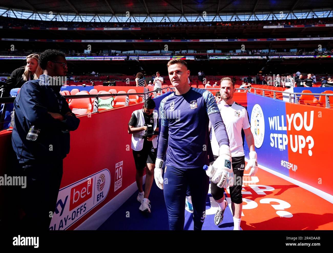Coventry City goalkeeper Ben Wilson makes his way out onto the pitch to ...